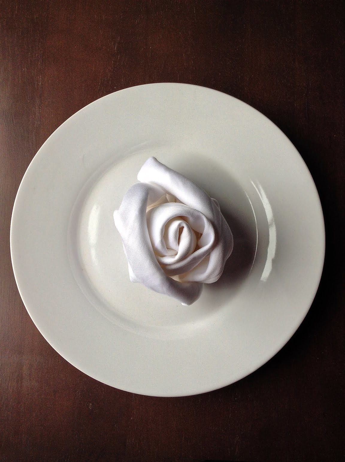 Easy Napkin Folding To Make A Rose Bud easy-napkin-folding-to-make-a-rose-bud
